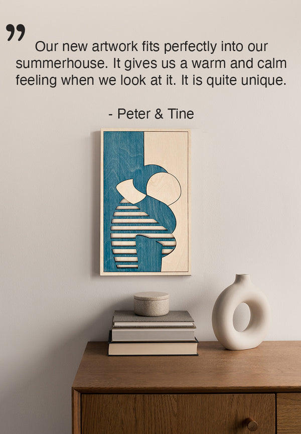 Graphic artwork of a hug cut in wood by KOLEKTO studio